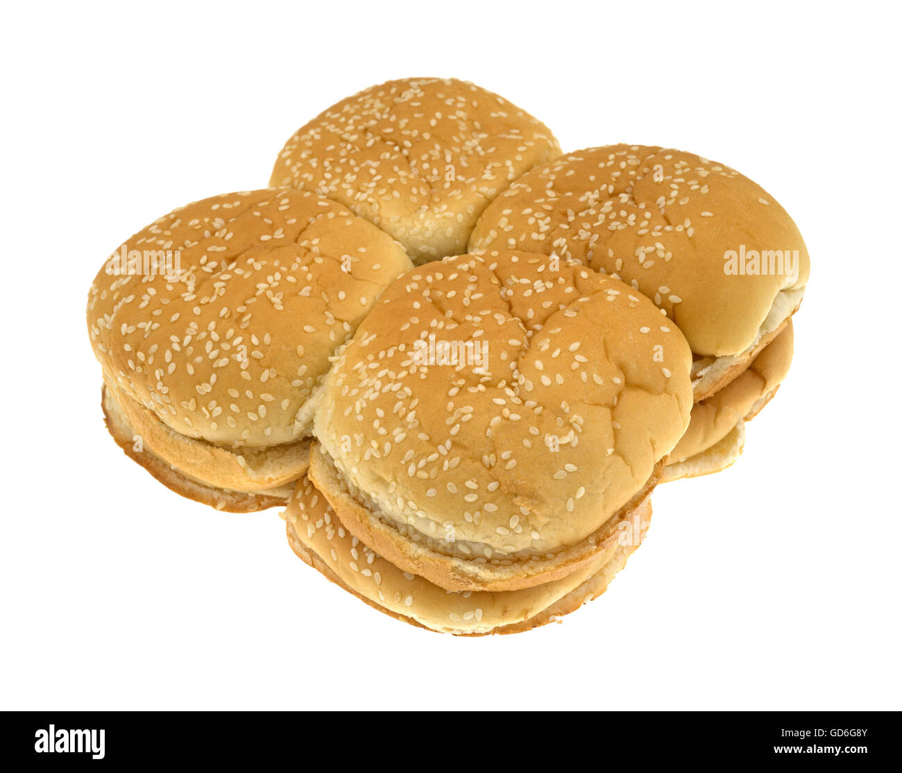 Side view of a group of sesame seeded hamburger buns isolated on a ...