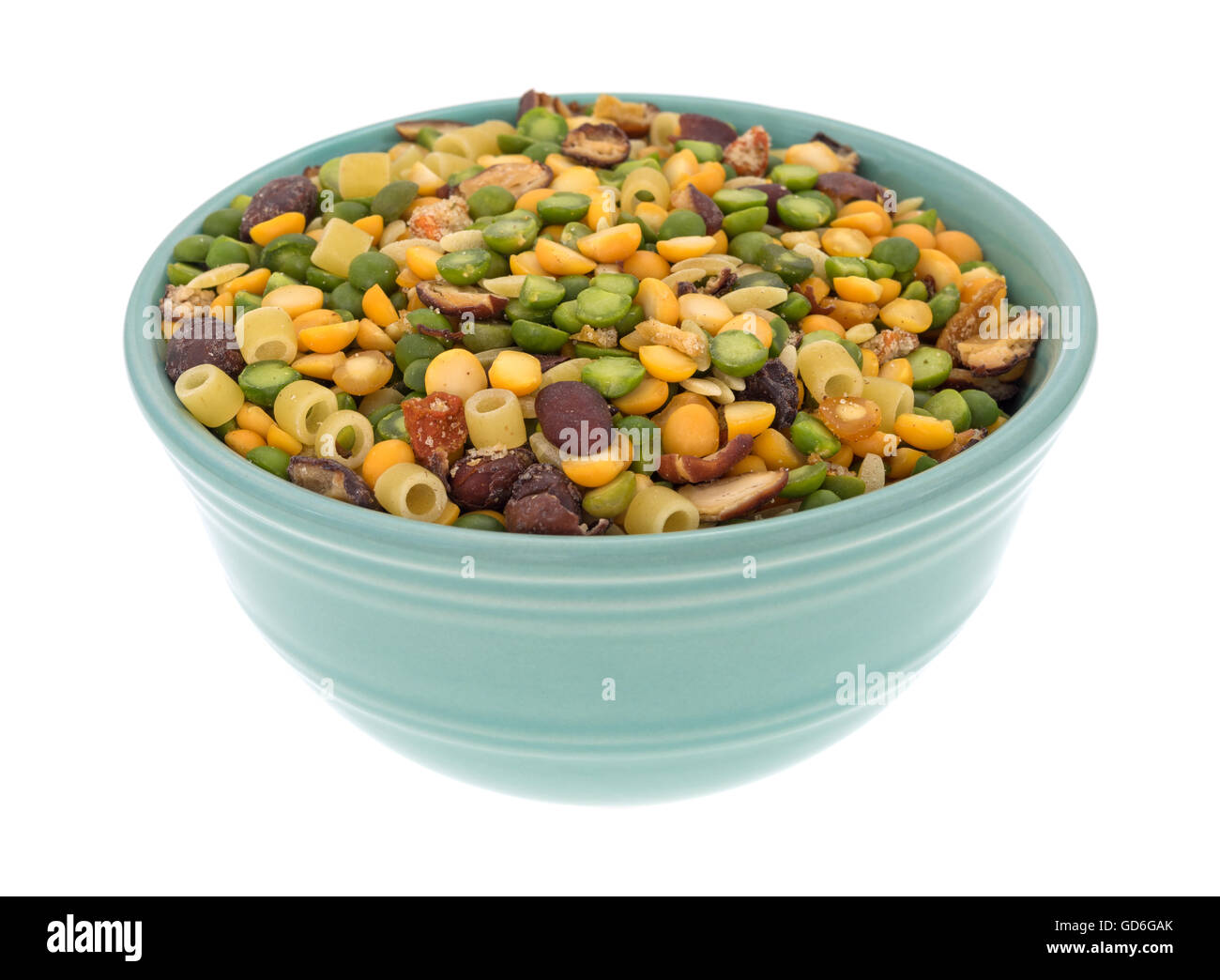 A bowl filled with dry minestrone soup mix isolated on a white ...