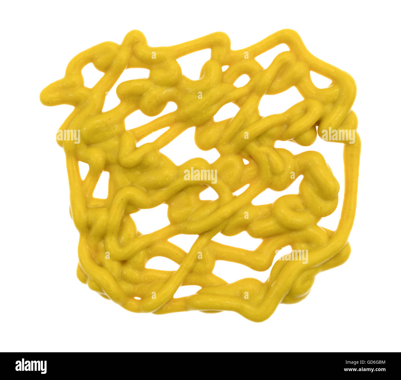 A lot of mustard squirted onto a white background Stock Photo - Alamy