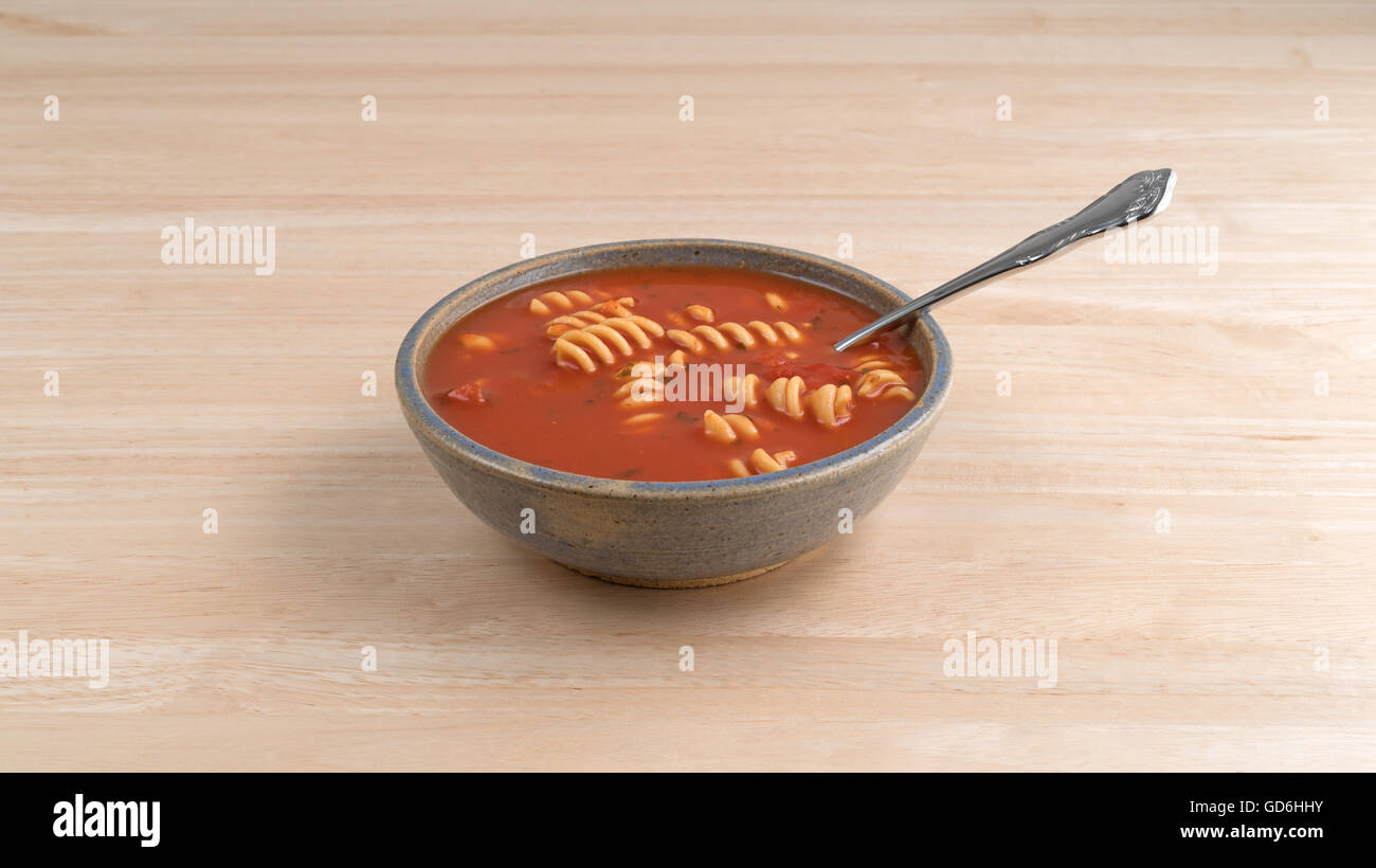 Serving tomato rotini soup in hi-res stock photography and images - Alamy