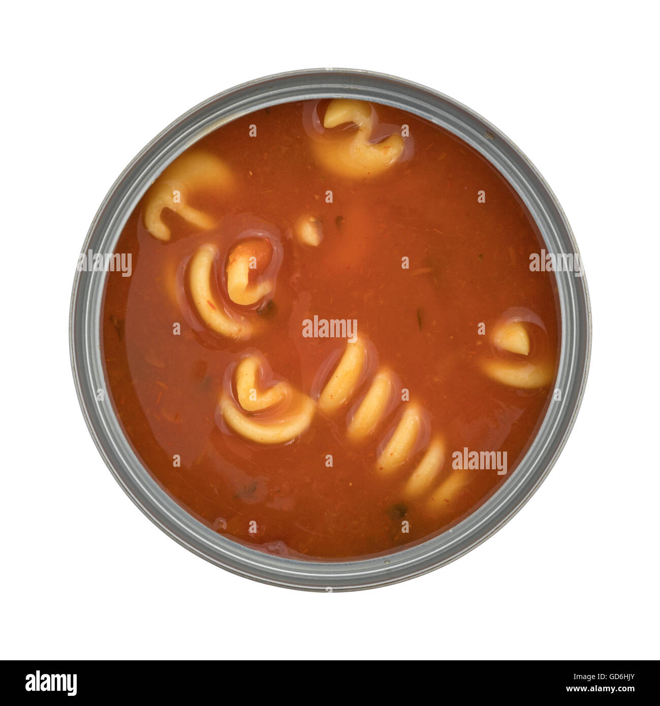 An opened can of rotini tomato soup isolated on a white background top ...