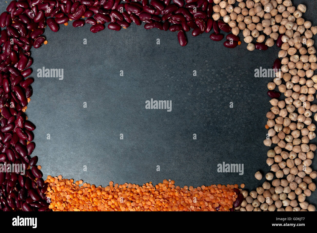 Frame made from Group of beans over black background with copy space ...