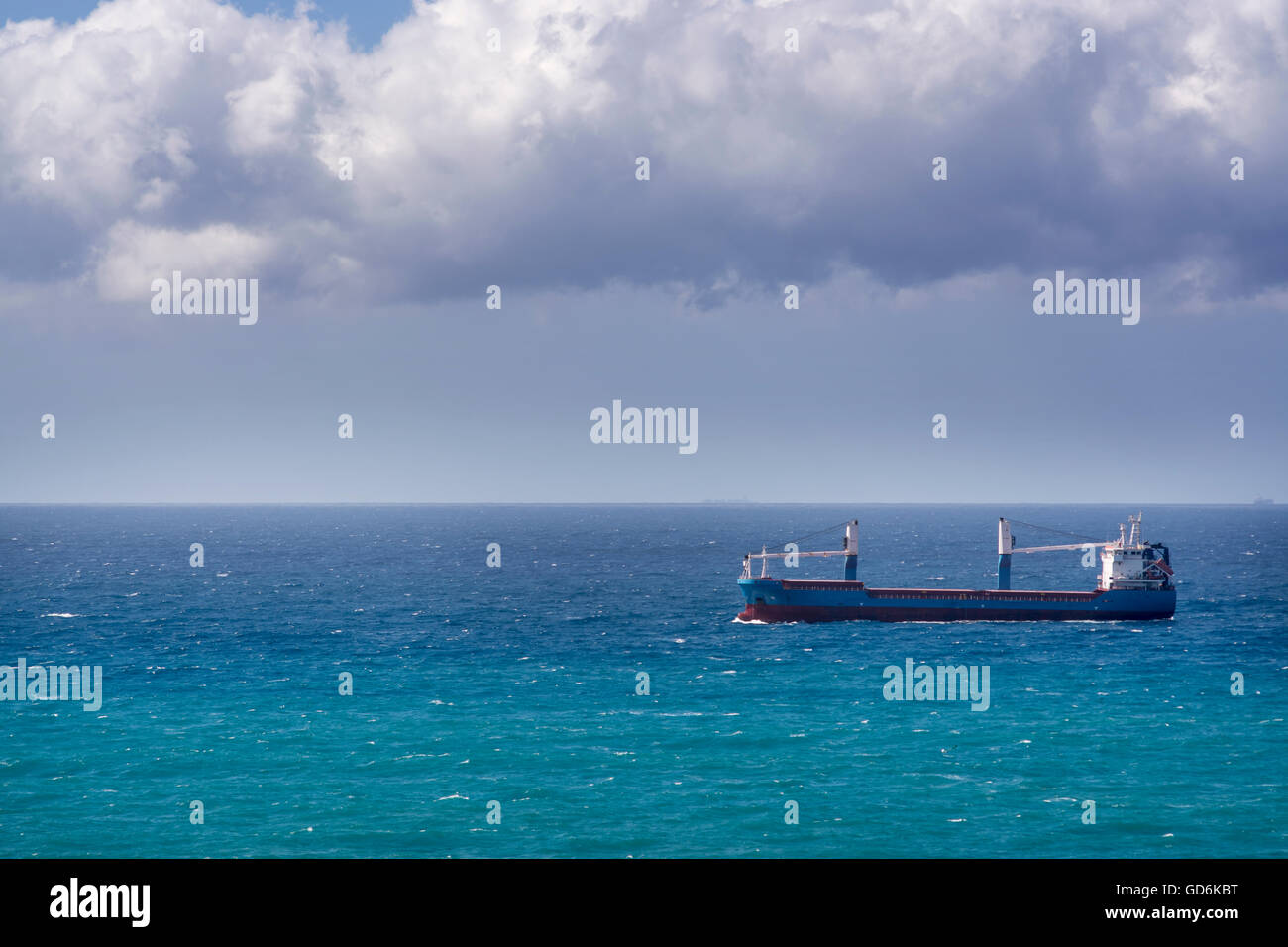 Container ships on the horizon Stock Photo - Alamy
