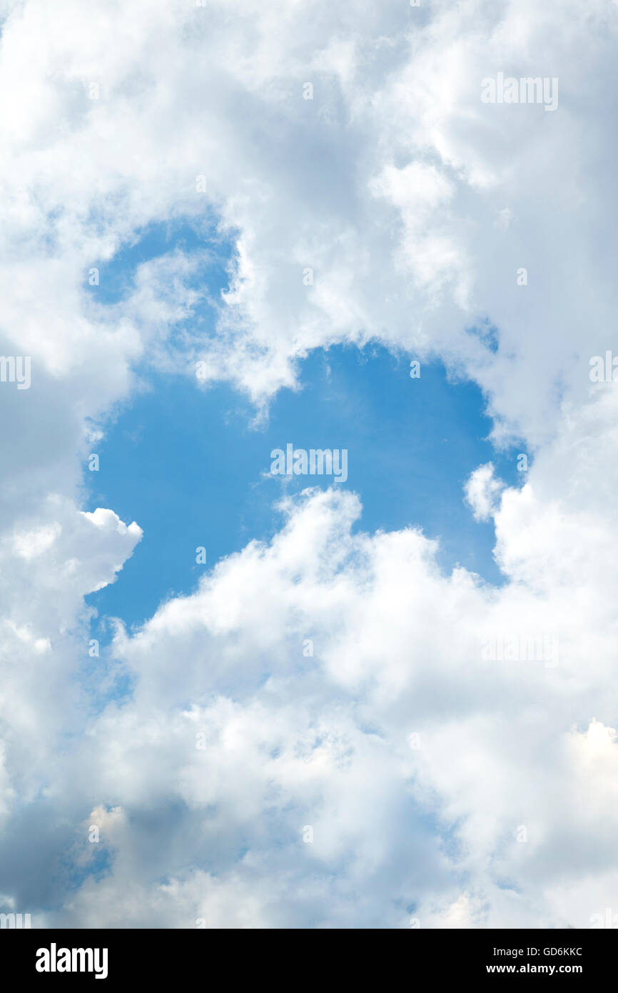 Clouds on a shiny blue sky Stock Photo - Alamy