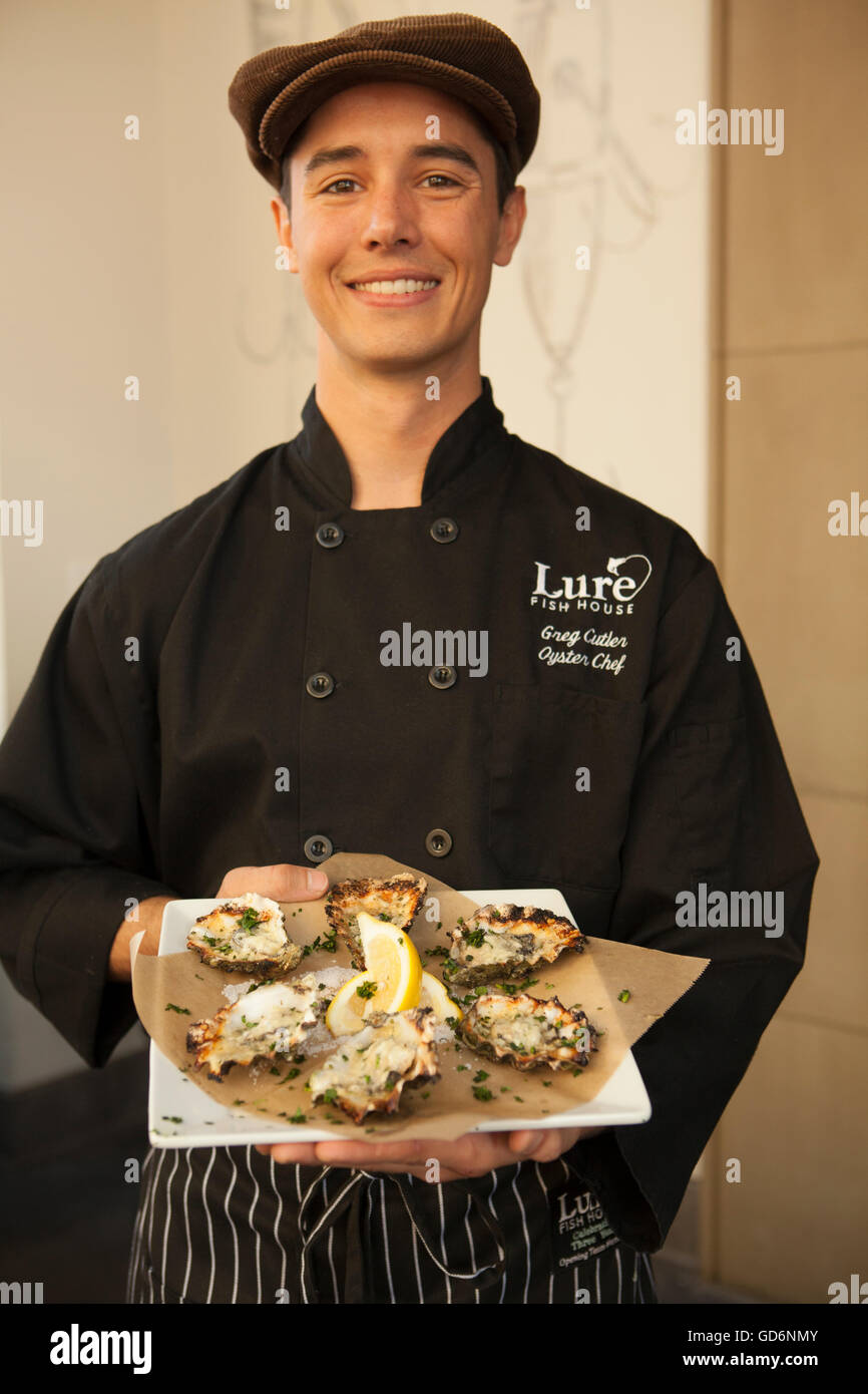Charbroiled oysters hi-res stock photography and images - Alamy
