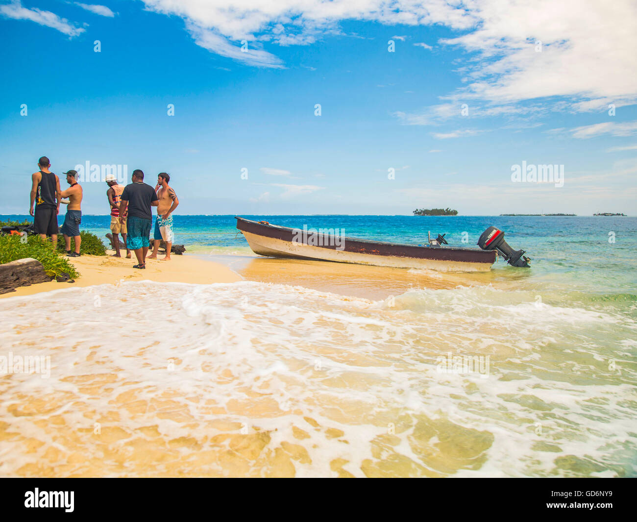 Group of guys on a small island in San Blas Stock Photo - Alamy