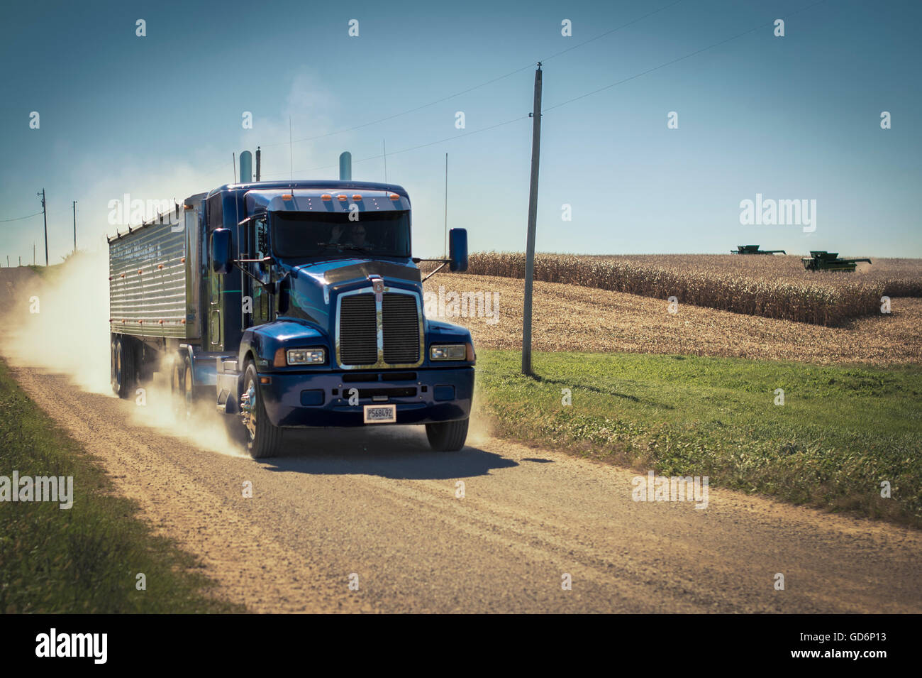Semi hauling corn from field to mill Stock Photo - Alamy