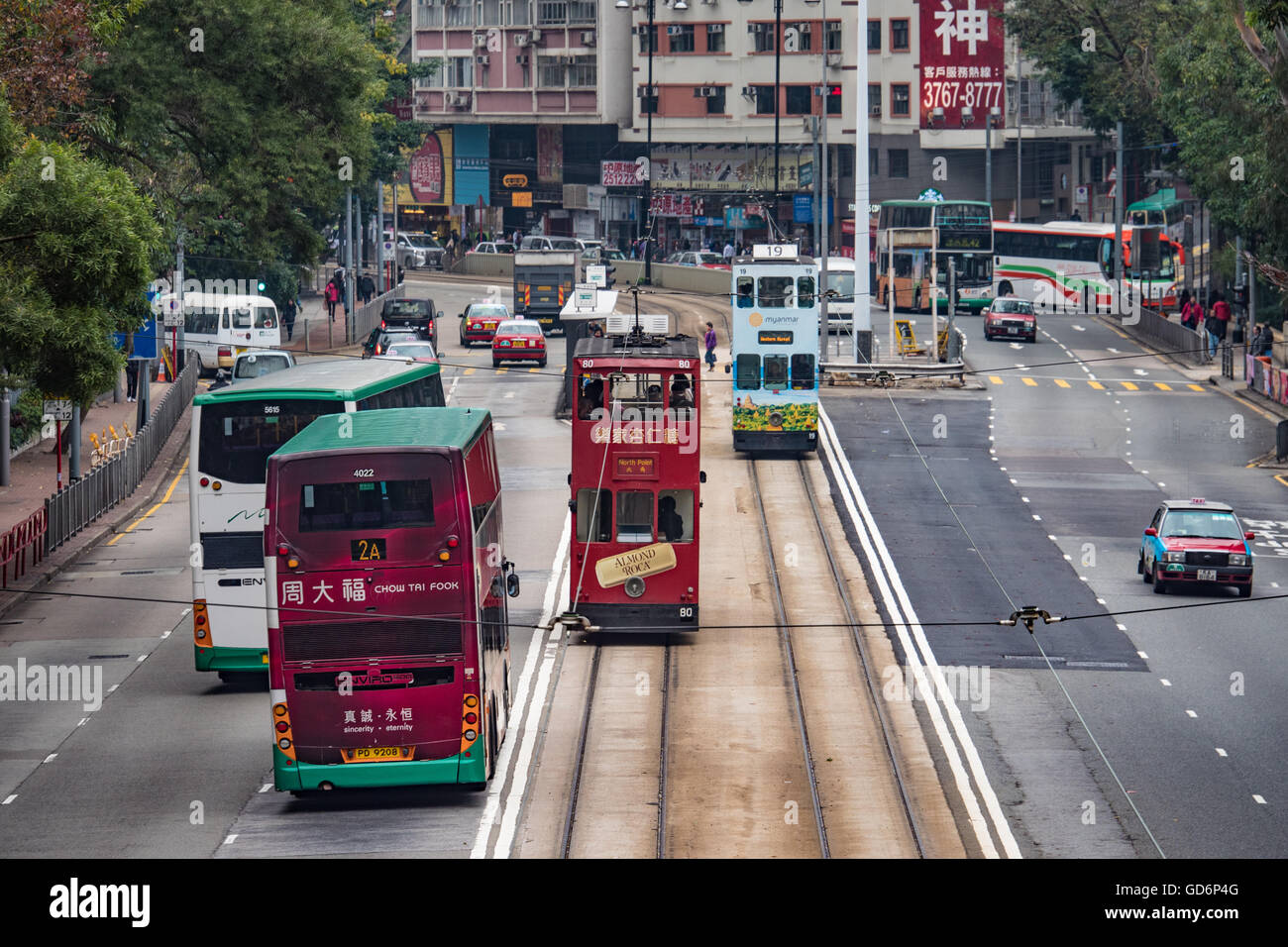 Trams and buses on Causeway Road, Hong Kong, China Stock Photo - Alamy