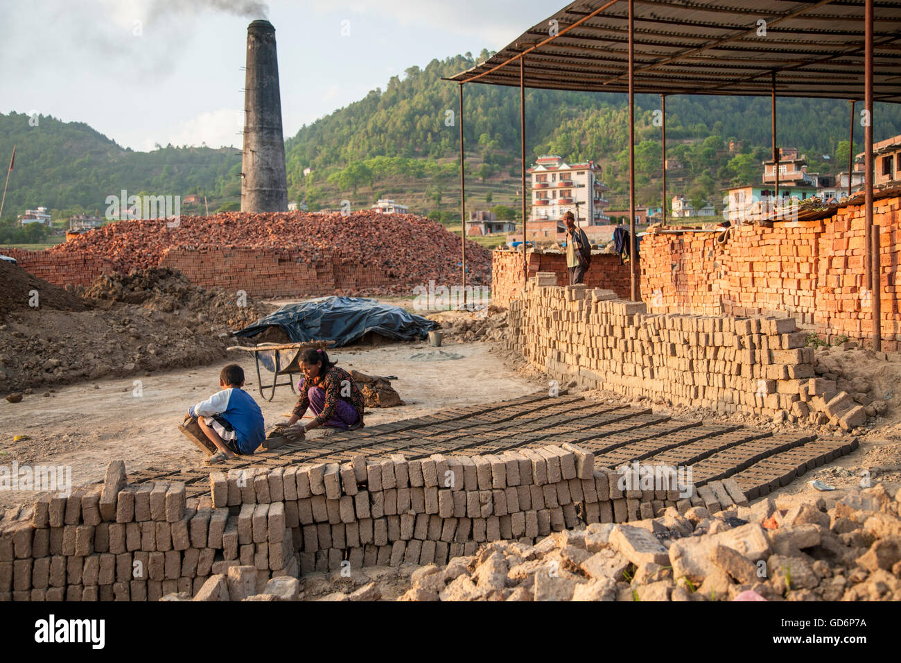 Making adobe to rebuild houses. Lele Village, 16 Kms from Patan. Nepal ...