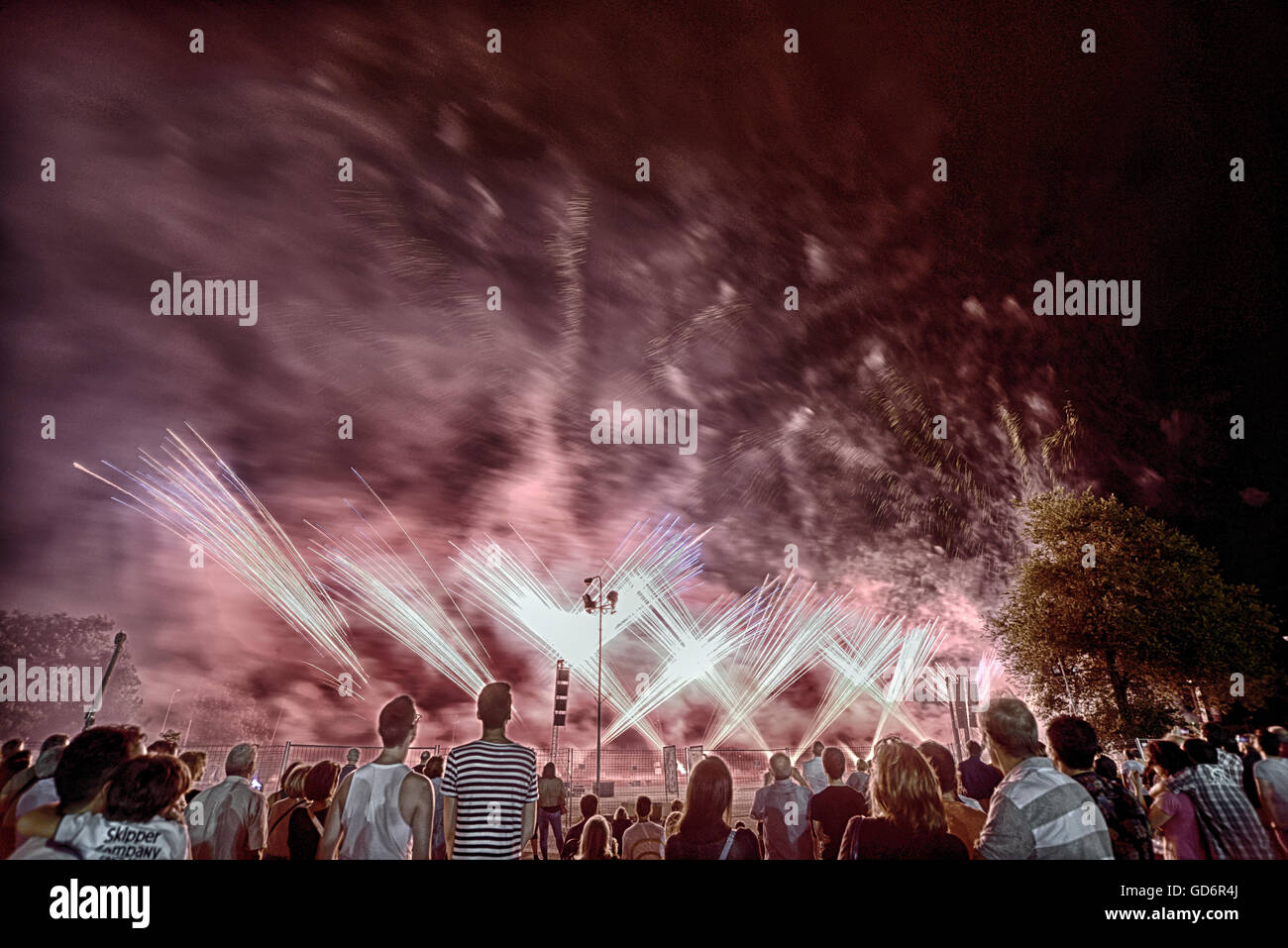 People watching fireworks show Stock Photo - Alamy