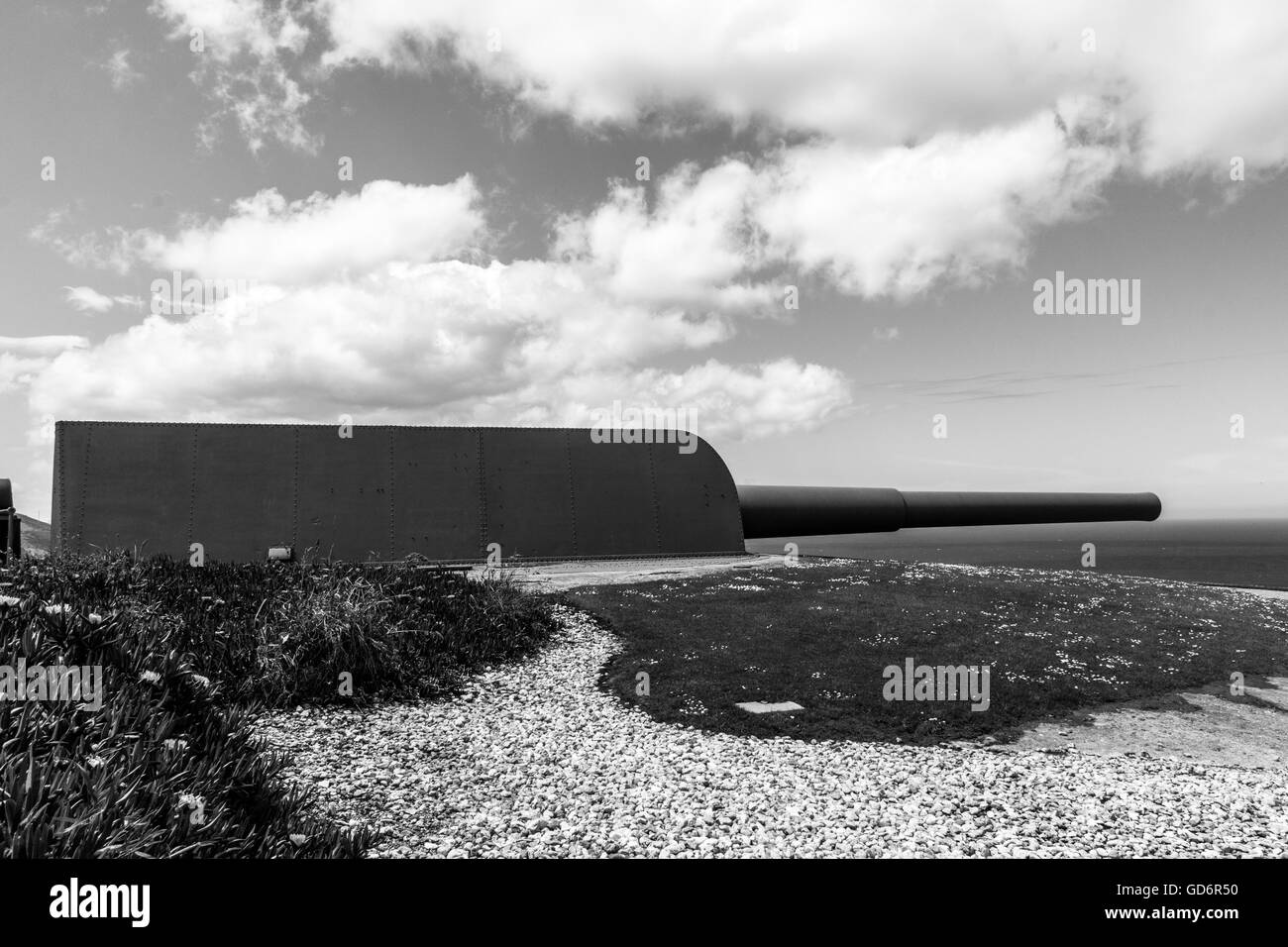 Side View of Old Cannon in Public Park Against Ocean and Clouds Stock ...