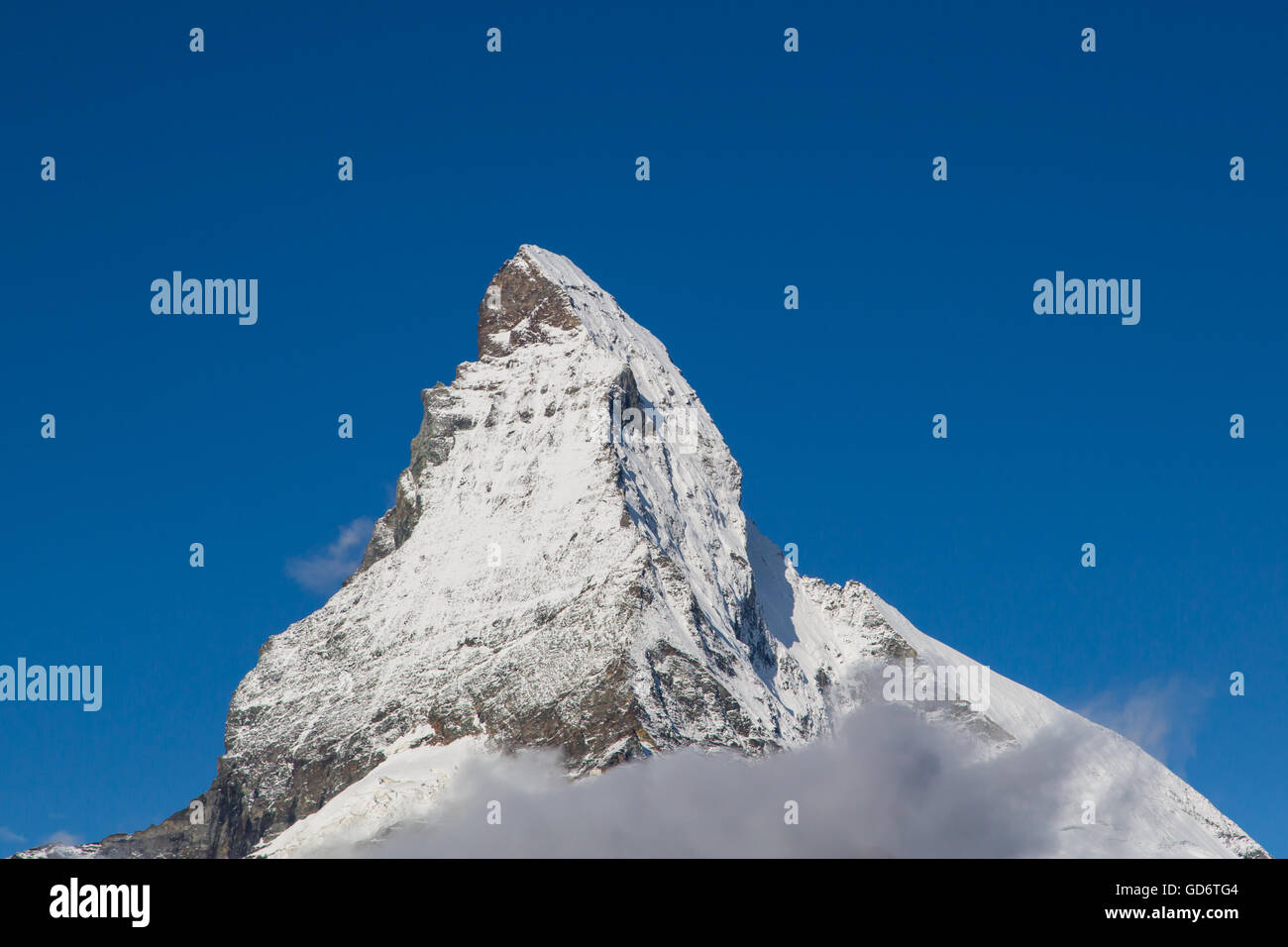 Top of Matterhorn mountain in Switzerland in deep blue sky Stock Photo ...