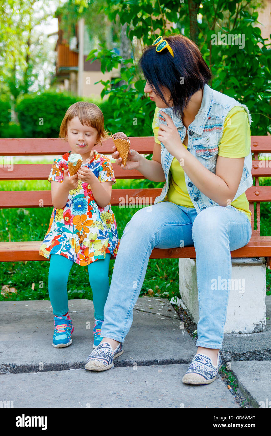 Mother And Daughter Eating Ice Cream Mom And Daughter Enjoy Fun Ice