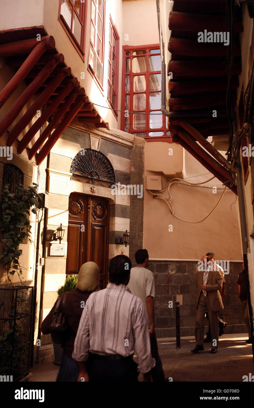 a street in the old town or souq in the city of Damaskus in Syria in ...