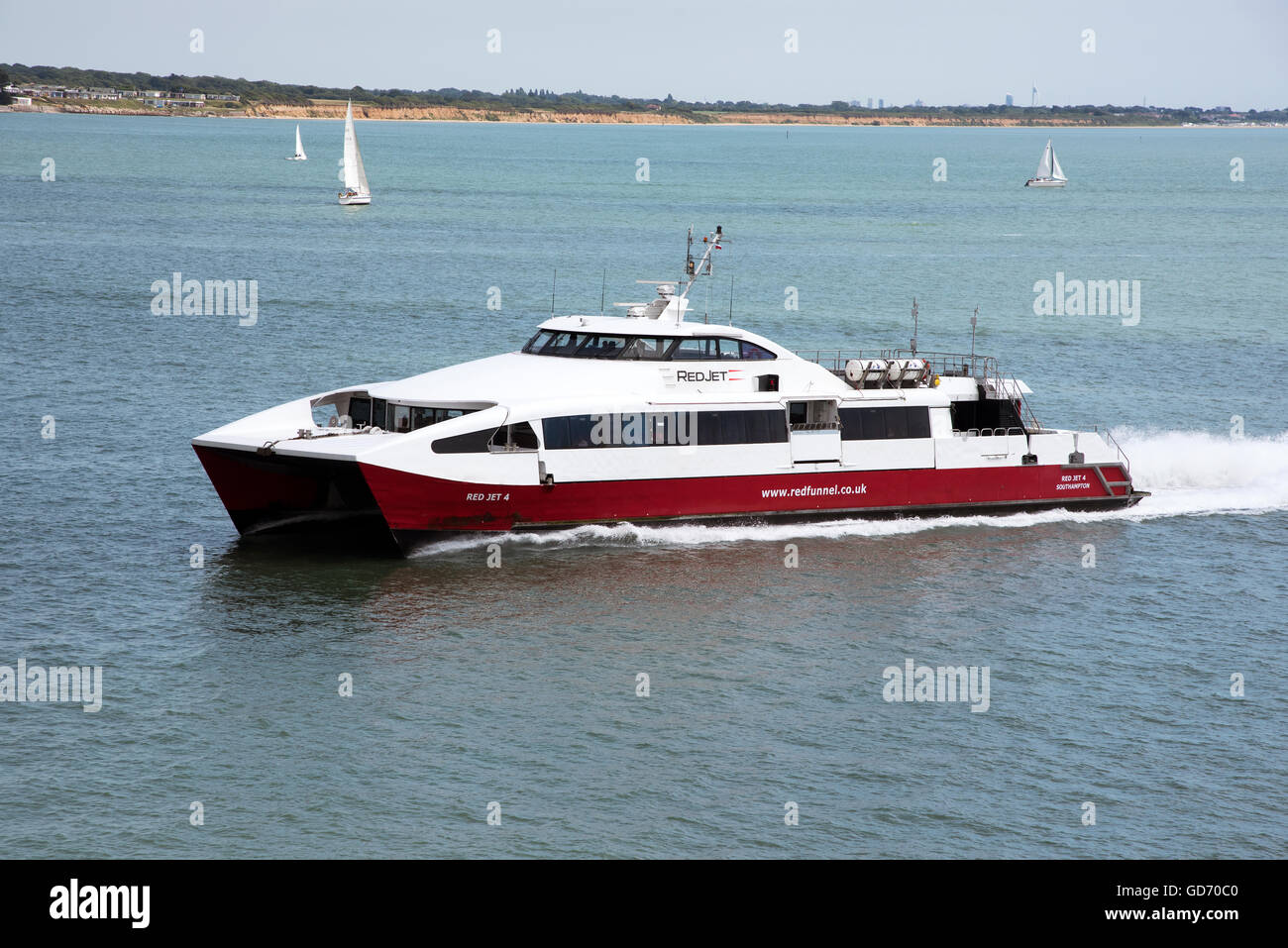 FAST FERRY UNDERWAY SOUTHAMPTON WATER UK A passenger carrying high ...