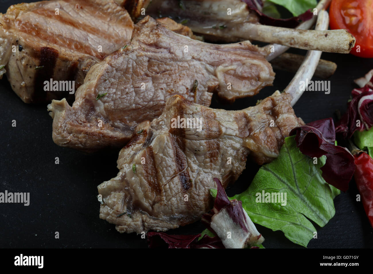 Lamb Frenched Rack grilled rib bone Stock Photo - Alamy