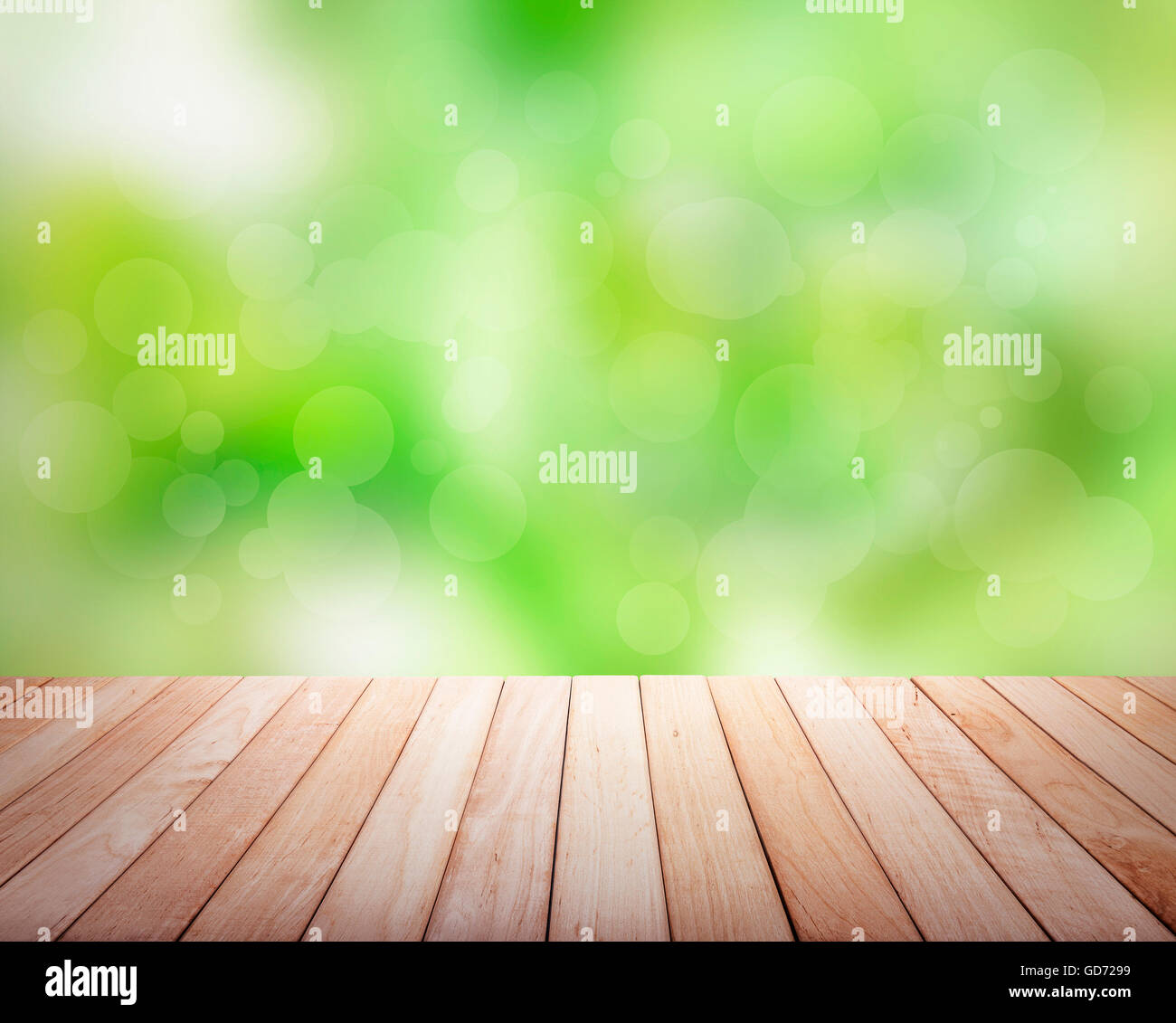 Wooden platform with green plants. Focus on platform Stock Photo - Alamy