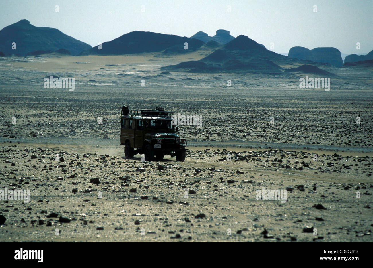 a car on a desert road in the Landscape and nature in the white desert ...