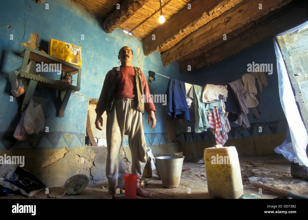 a men in his house in the old town of the Oasis and village of Siwa in ...
