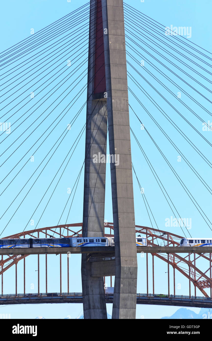 Skytrain Rapid transit bridge crossing the Fraser River from new ...