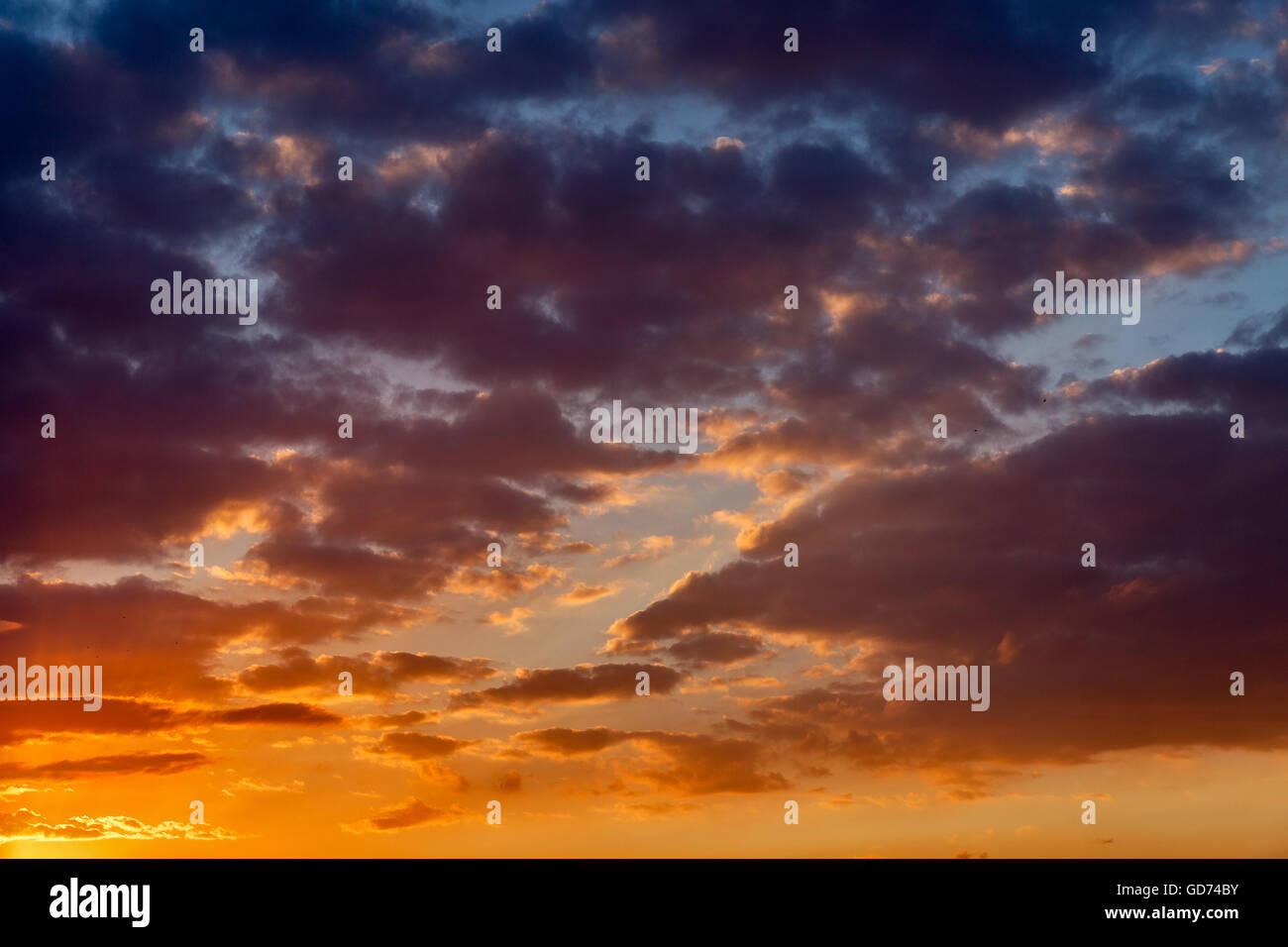 dramatic sunset sky with orange clouds Stock Photo - Alamy