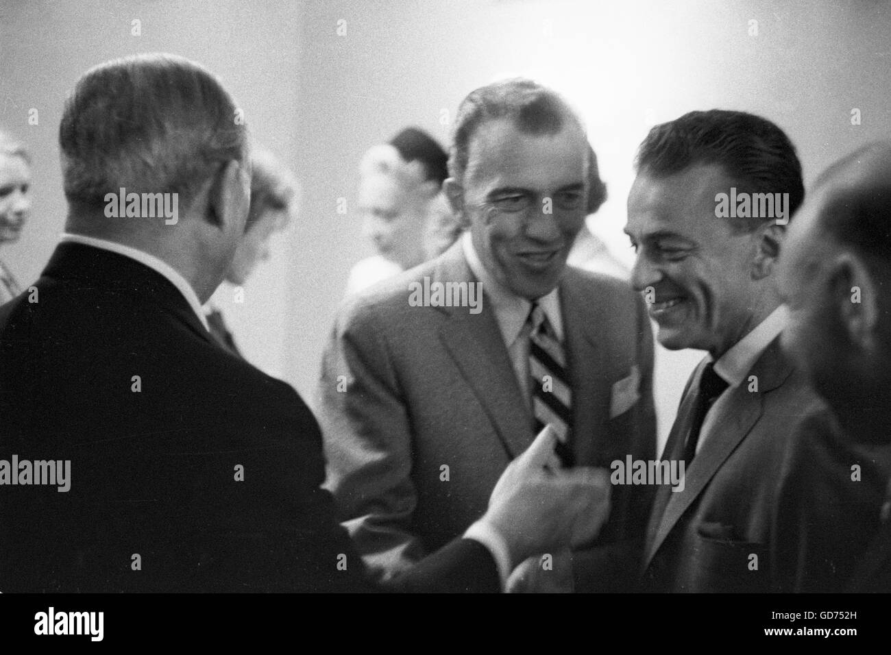 Ed Sullivan speaking with guests at a party, 1962 Stock Photo - Alamy