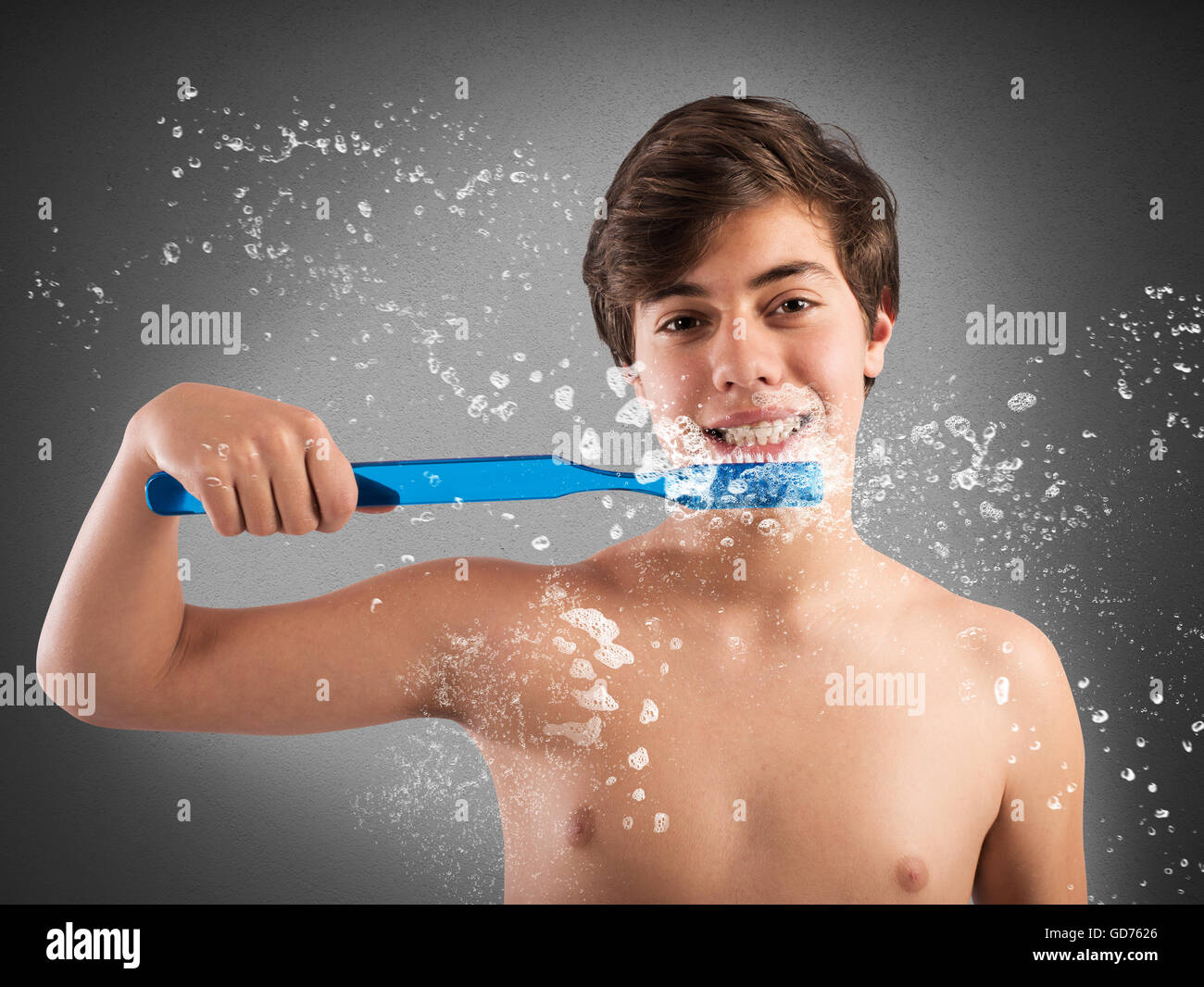 Teen boy brushing teeth hi-res stock photography and images - Alamy