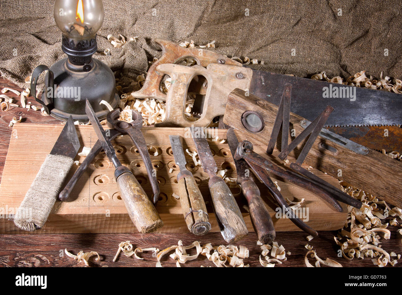 Workplace carpenter. Wood and a few tools Stock Photo - Alamy