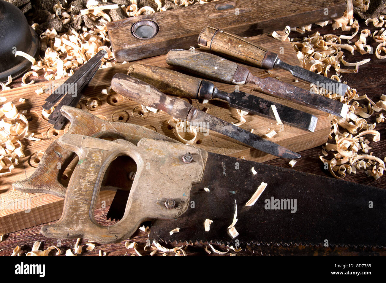 Workplace carpenter. Wood and a few tools Stock Photo - Alamy