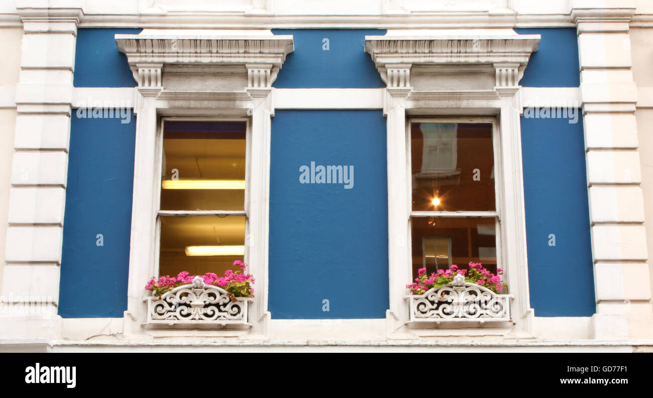 Pair of british window (facade view Stock Photo - Alamy