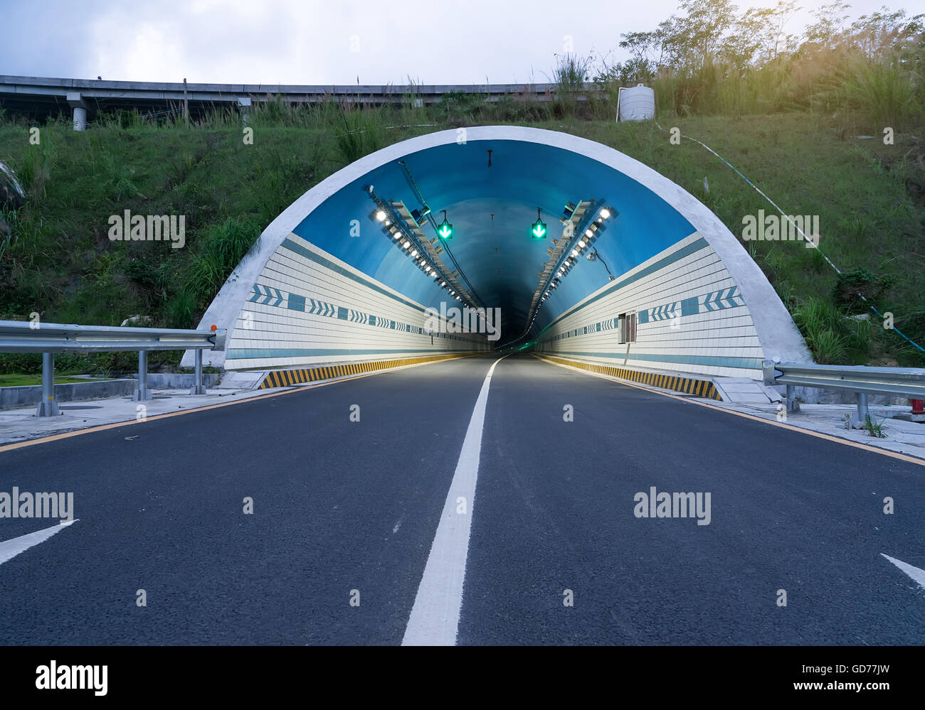 Car driving on to tunnel Stock Photo - Alamy