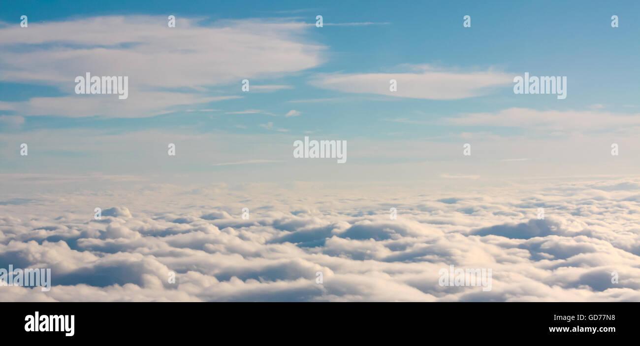 Flying in the sky over the clouds Stock Photo - Alamy