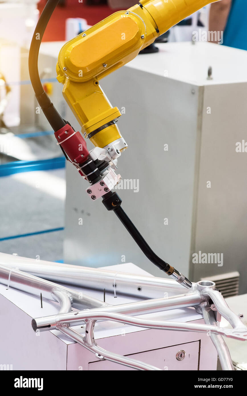 robotic hand machine tool at industrial manufacture factory Stock Photo ...