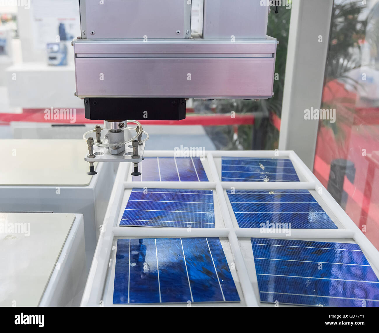production of solar panels, Industrial robot working in factory ...