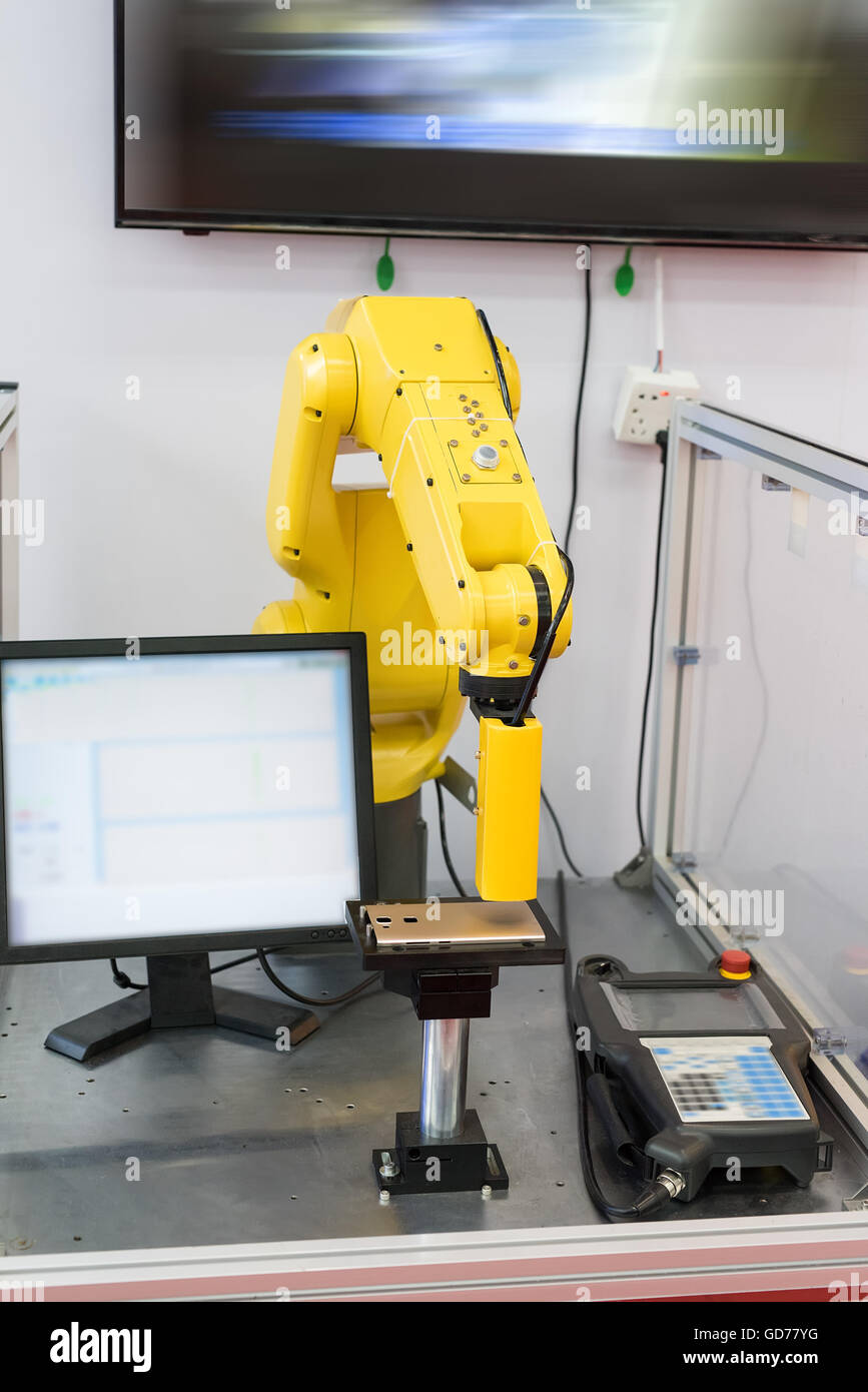 robotic hand machine tool at industrial manufacture factory Stock Photo ...