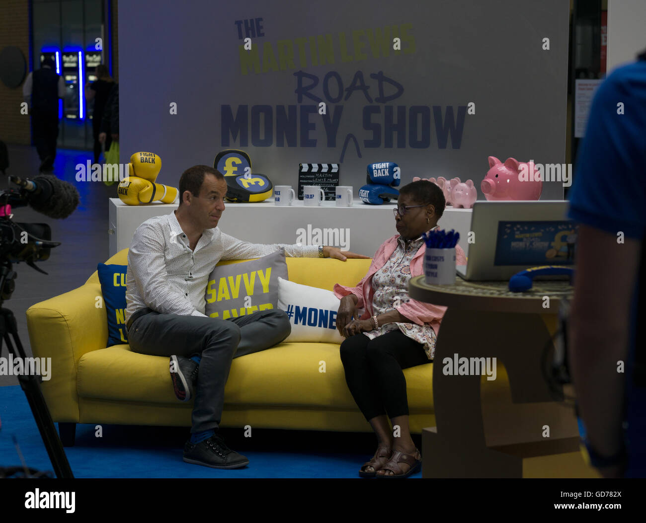 Martin Lewis conducting a live interview on the Money Show film set at ...