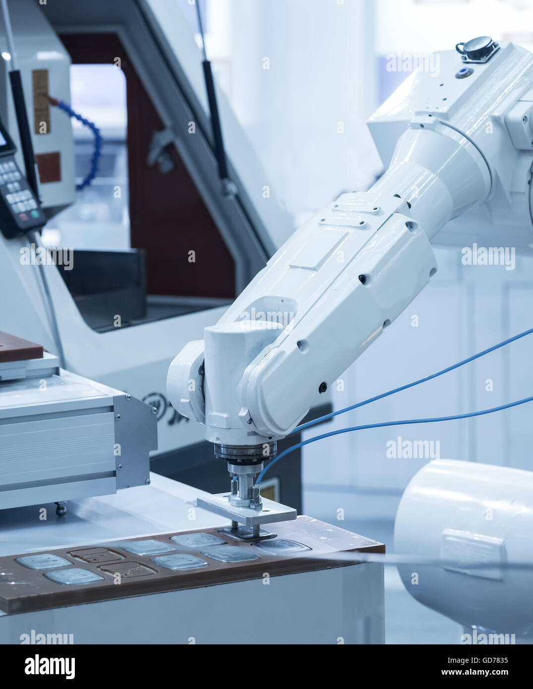 robotic hand machine tool at industrial manufacture factory Stock Photo ...