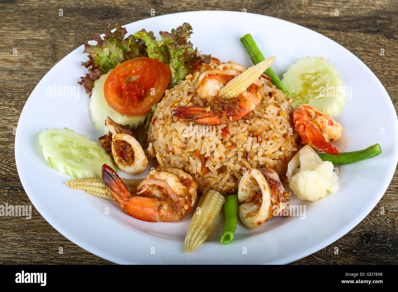 Asian style Fried rice with seafood, herbs and spices Stock Photo - Alamy