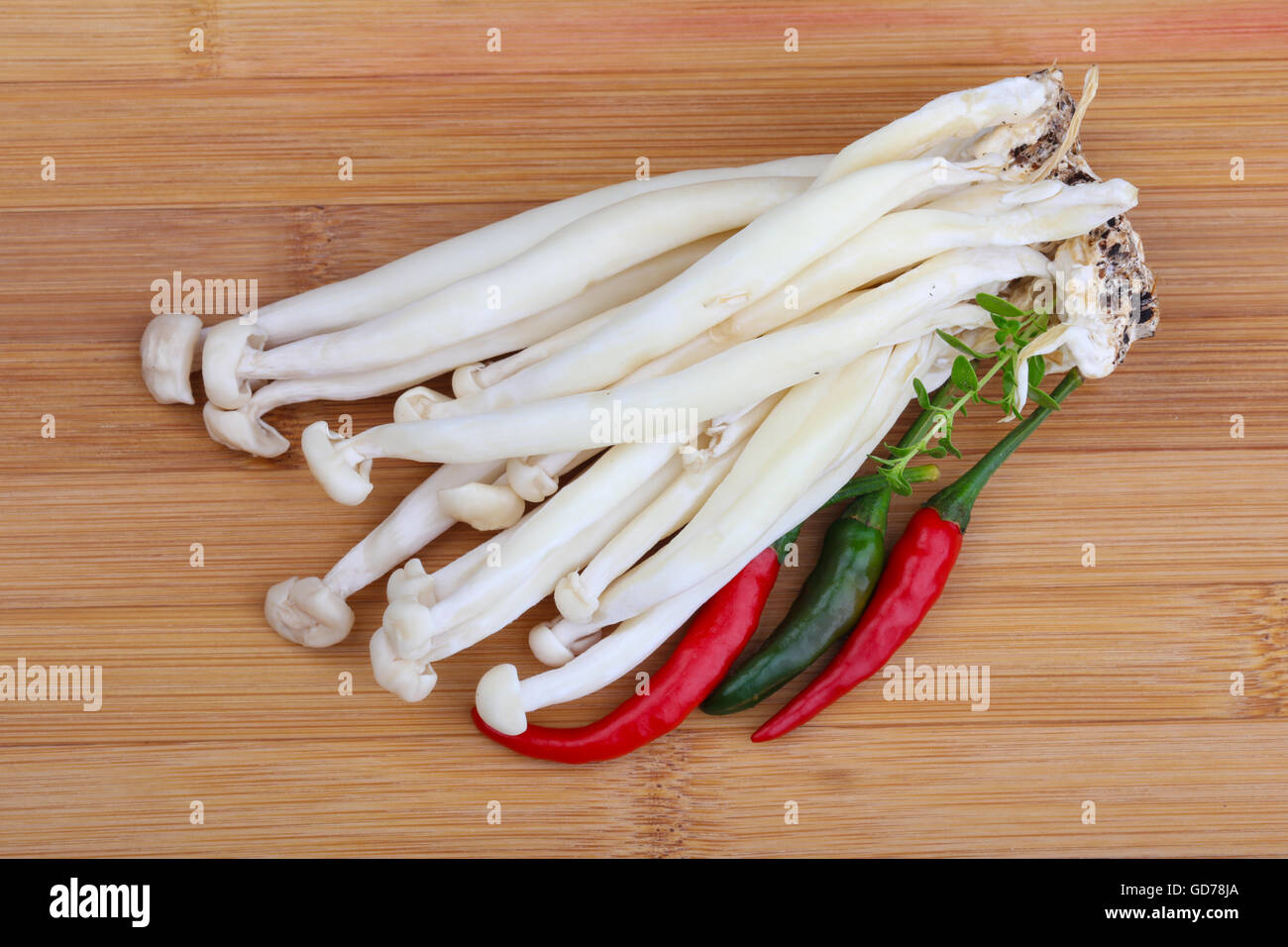 Japanese mushroom - enoki raw food ready for cooking Stock Photo - Alamy