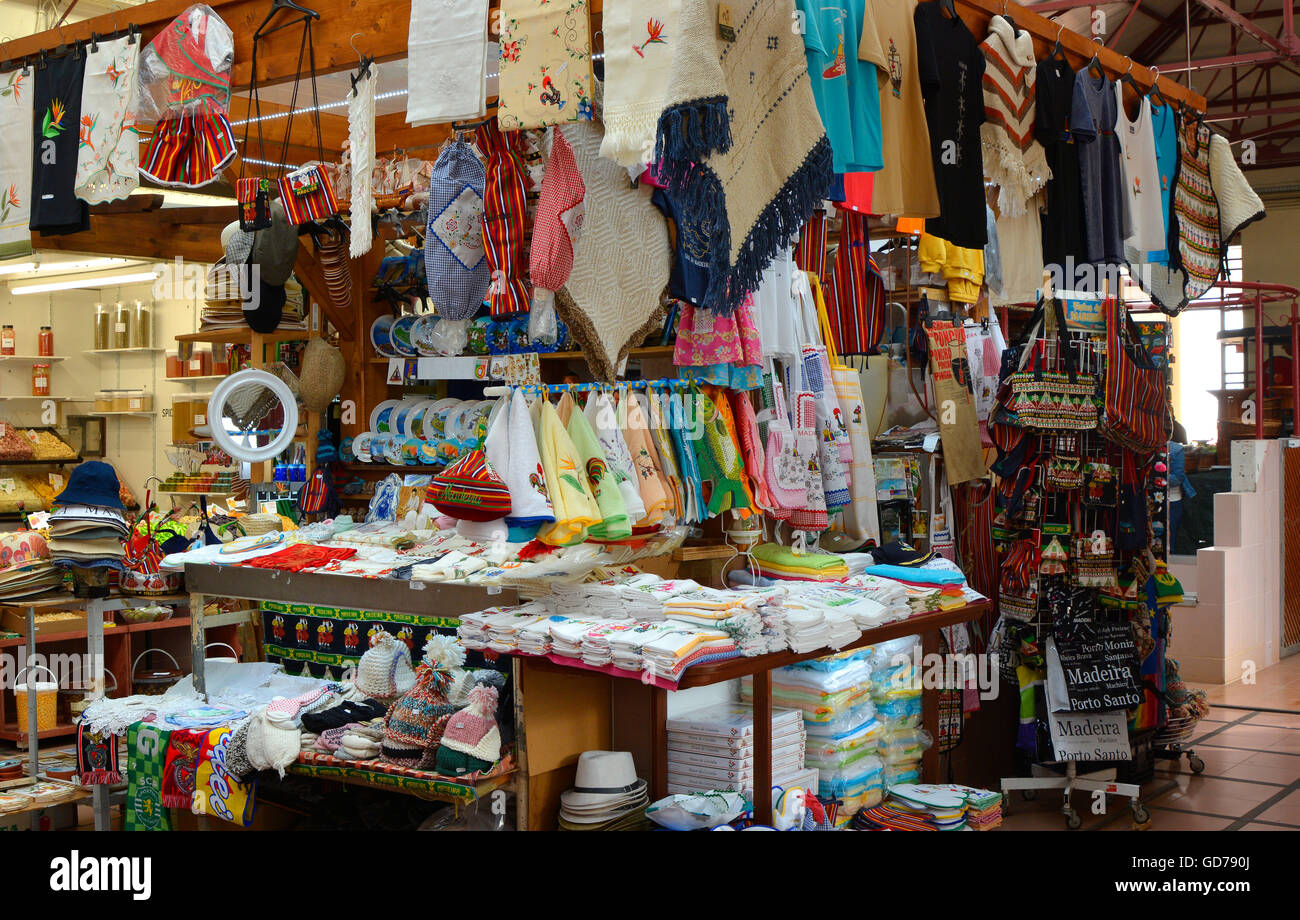 Display of clothes and textile products in the indoor market of Funchal ...
