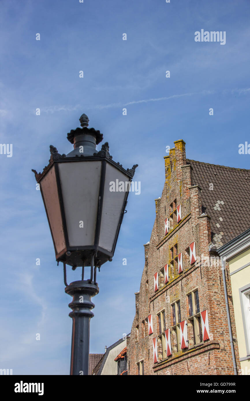 Historical house and lantern in the old center of Kalkar, Germany Stock ...