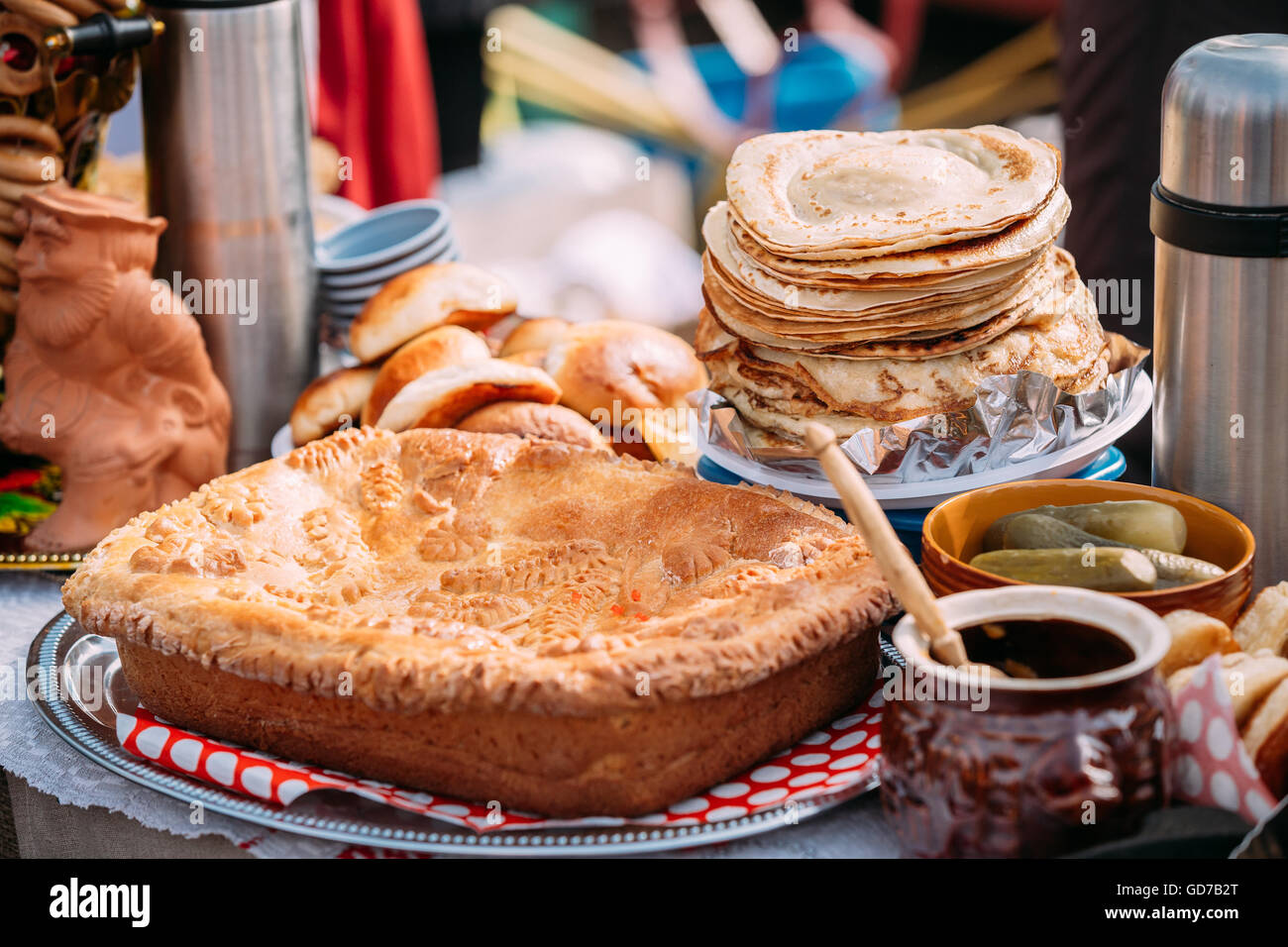 The dishes of the traditional Belarusian cuisine - pie, pancakes and ...