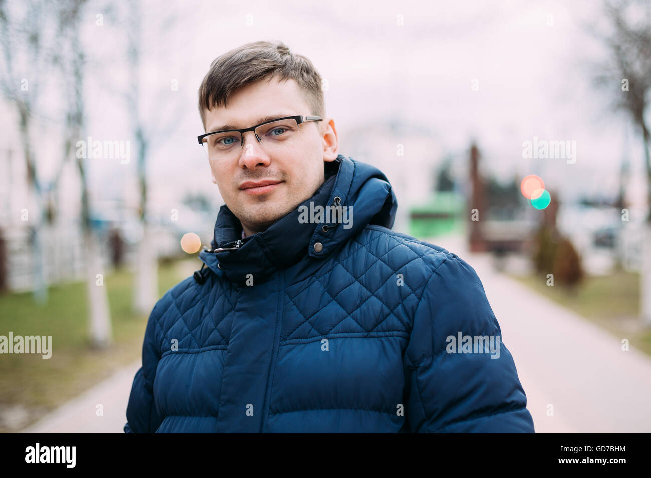 Man in blue jacket hi-res stock photography and images - Alamy