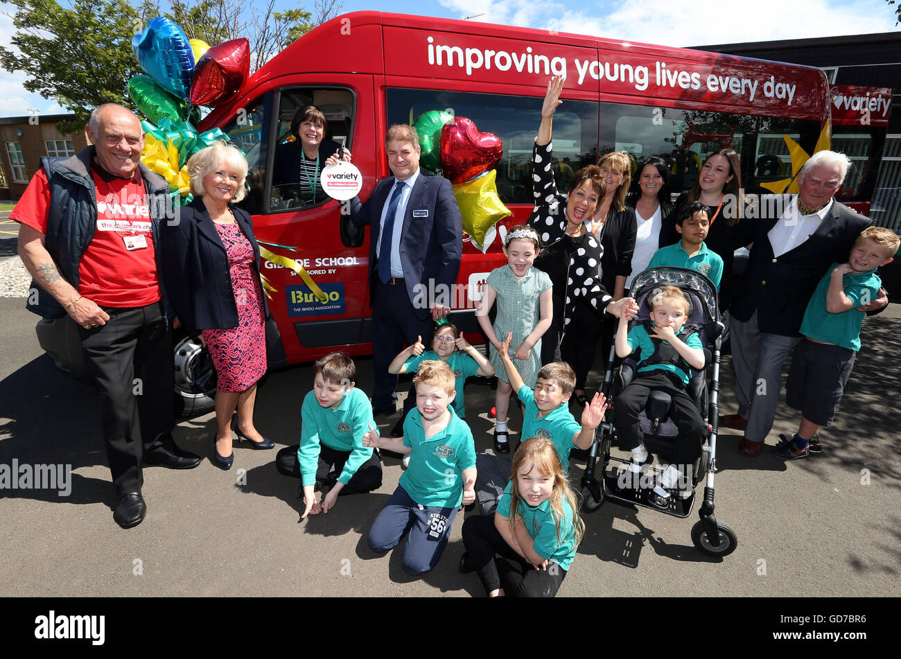 Gibside school headteacher Judith Donovan (in bus), receives the key ...