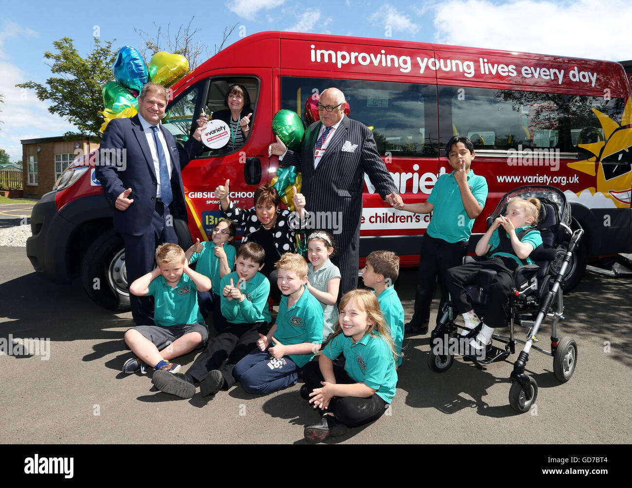 Gibside school headteacher Judith Donovan (second left), receives the ...