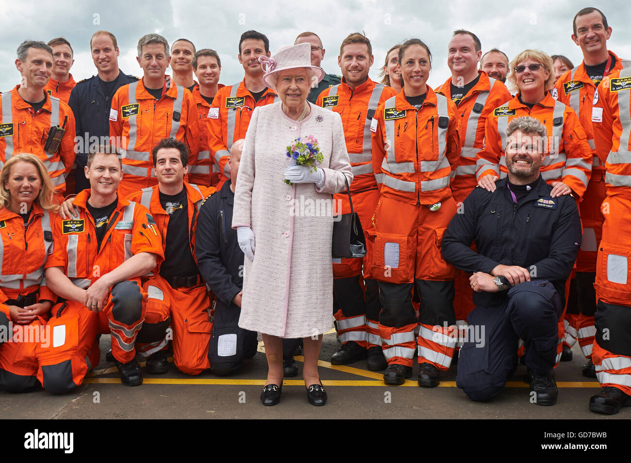 Queen Elizabeth II with crew members including her grandson, the Duke ...