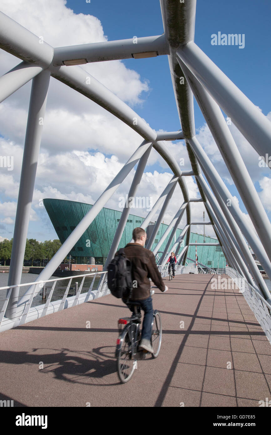 Canal Bridge to Nemo Science Museum with Cyclists, Amsterdam; Holland ...