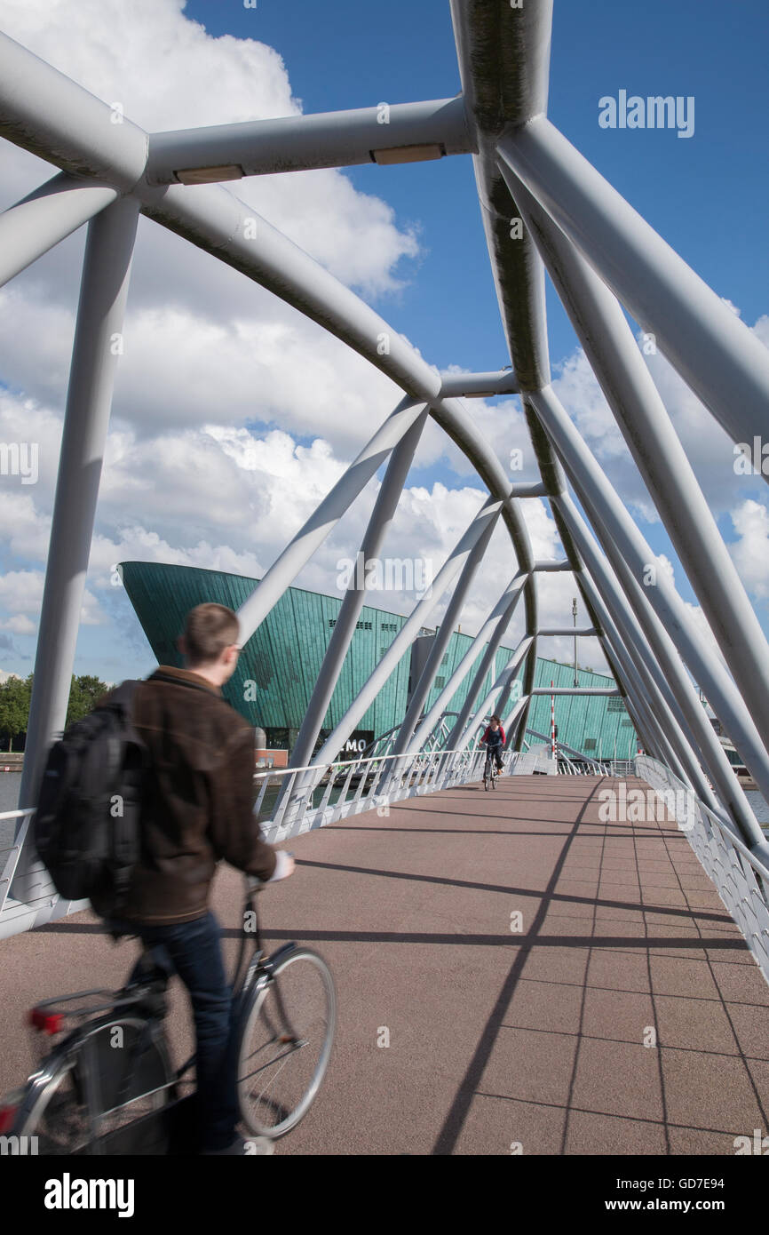 Canal Bridge to Nemo Science Museum with Cyclists, Amsterdam; Holland ...