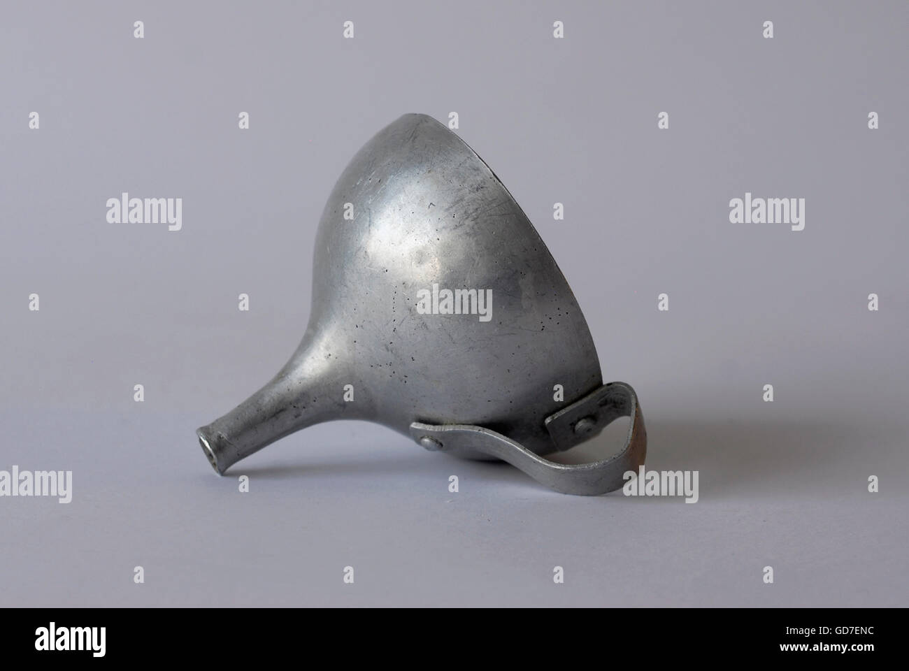 Old aluminum funnel for kitchen Stock Photo - Alamy