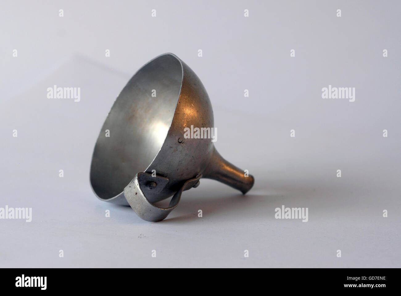 Old aluminum funnel for kitchen Stock Photo - Alamy